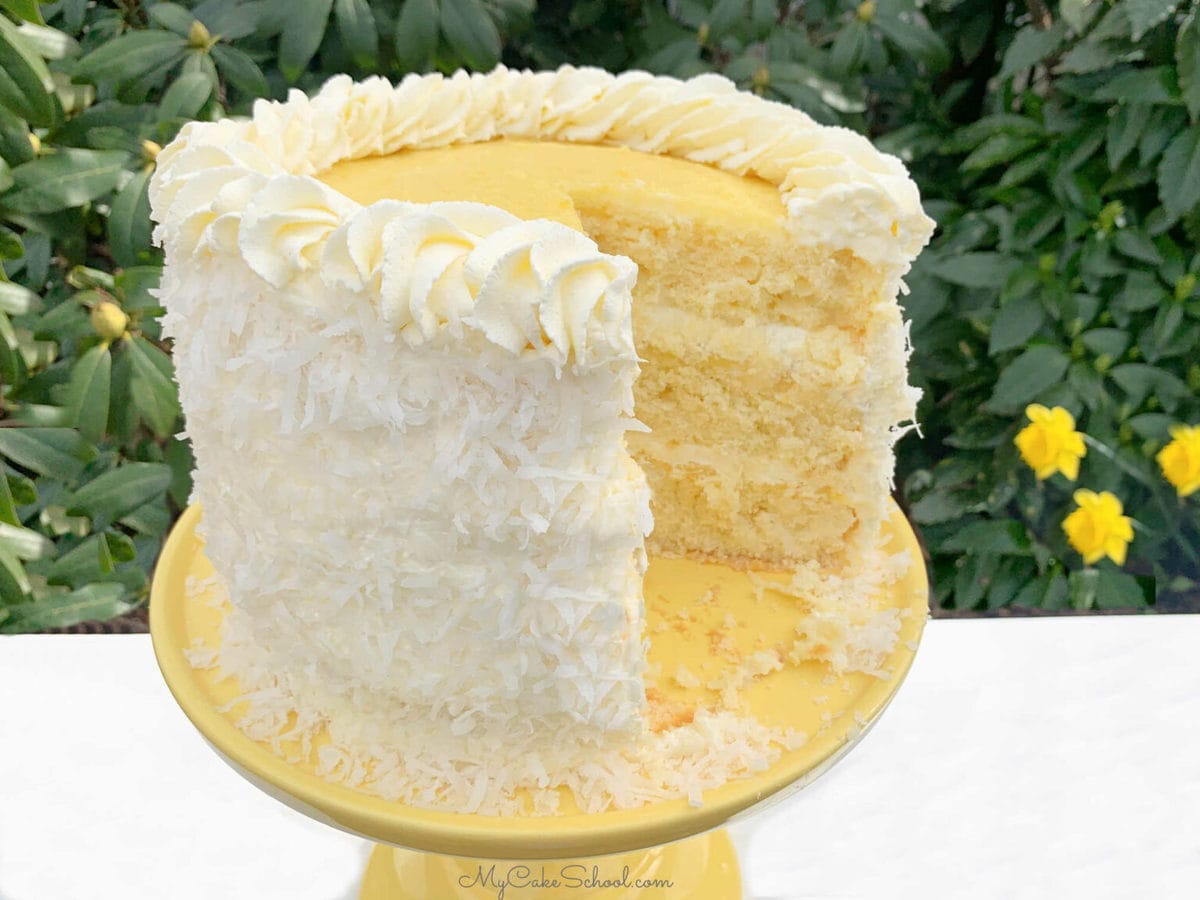 Lemon Coconut Cake with Lemon Curd Filling - My Cake School