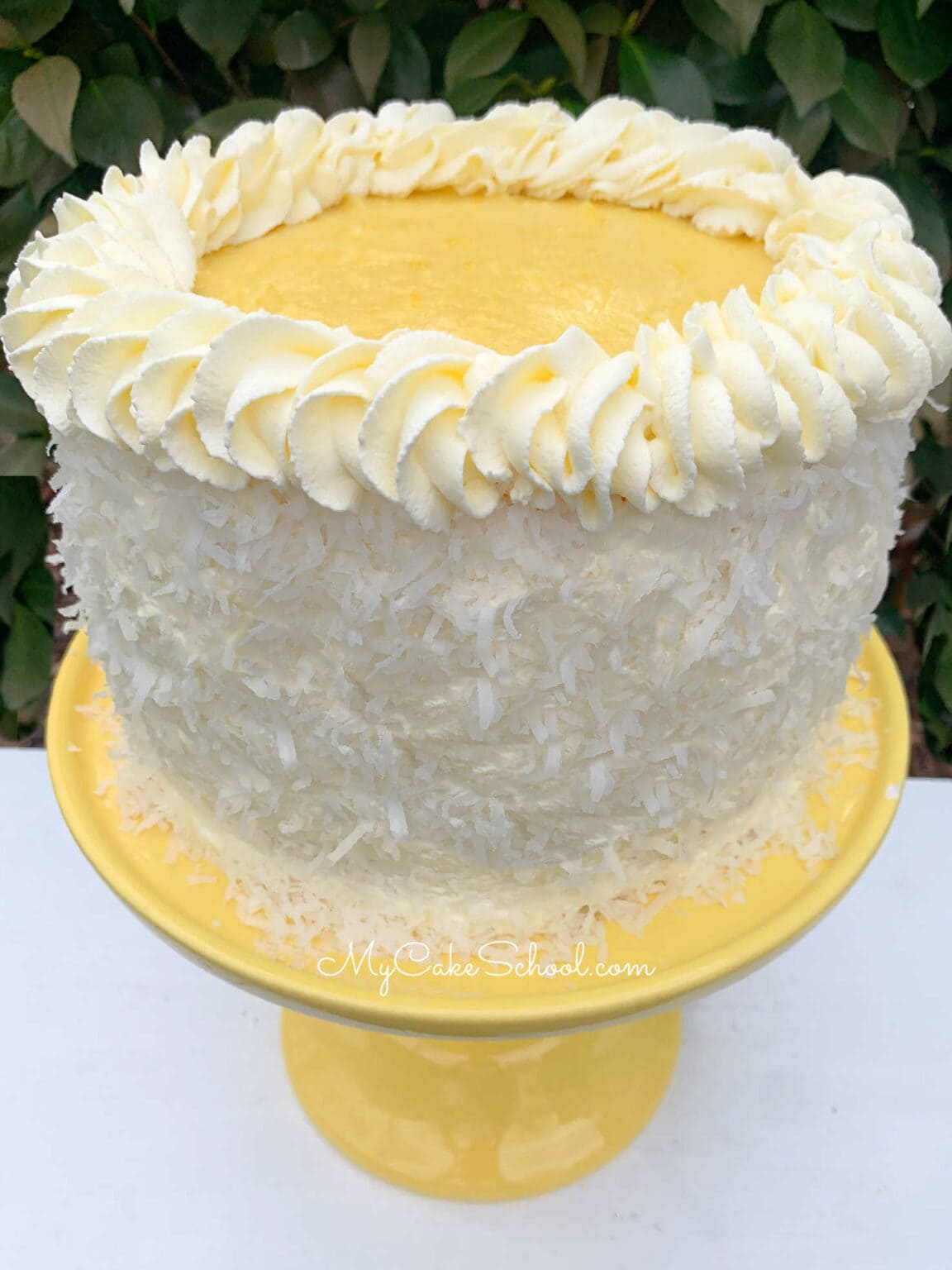 Lemon Coconut Cake with Lemon Curd Filling - My Cake School