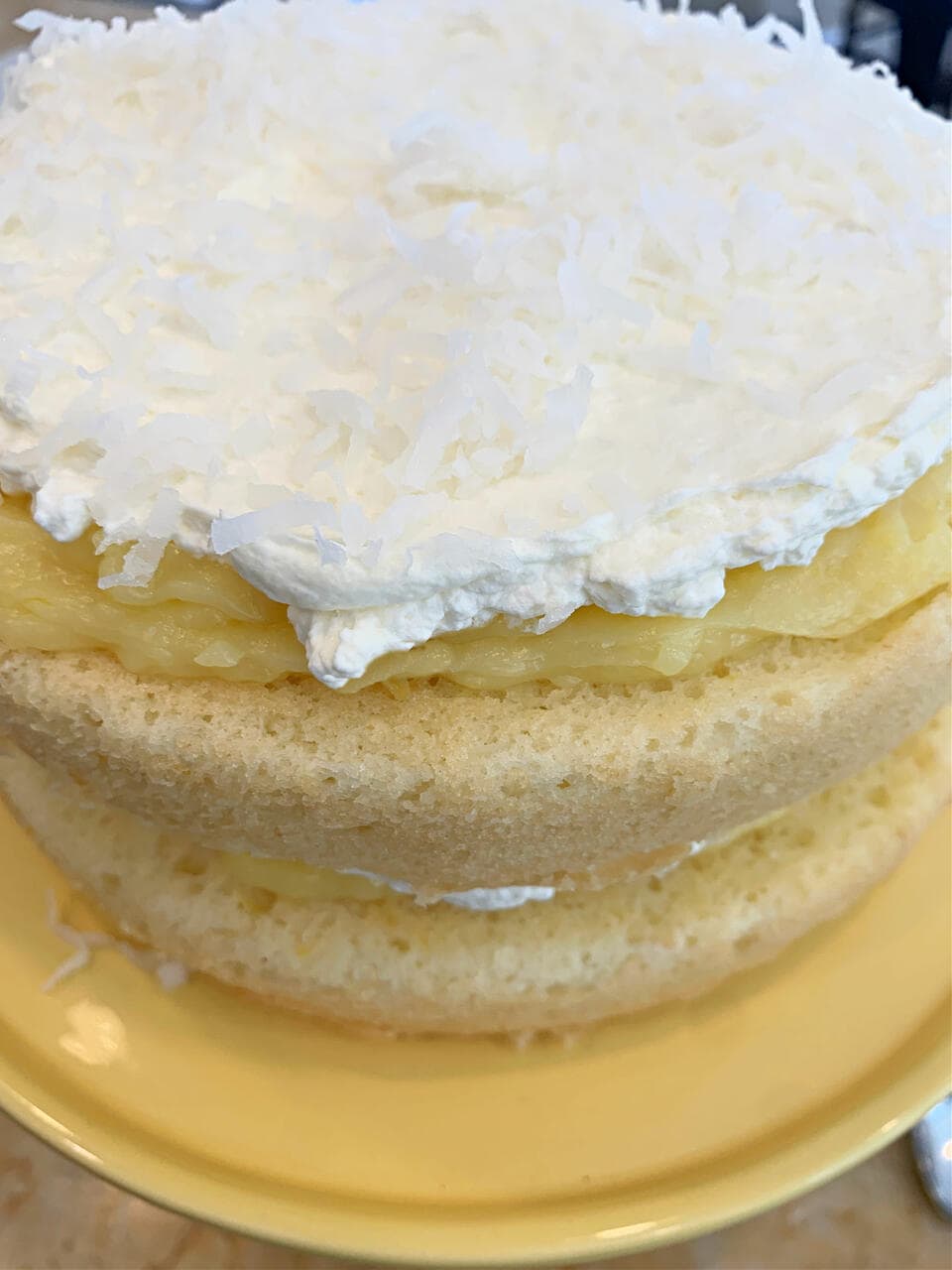 Lemon Coconut Cake with Lemon Curd Filling - My Cake School