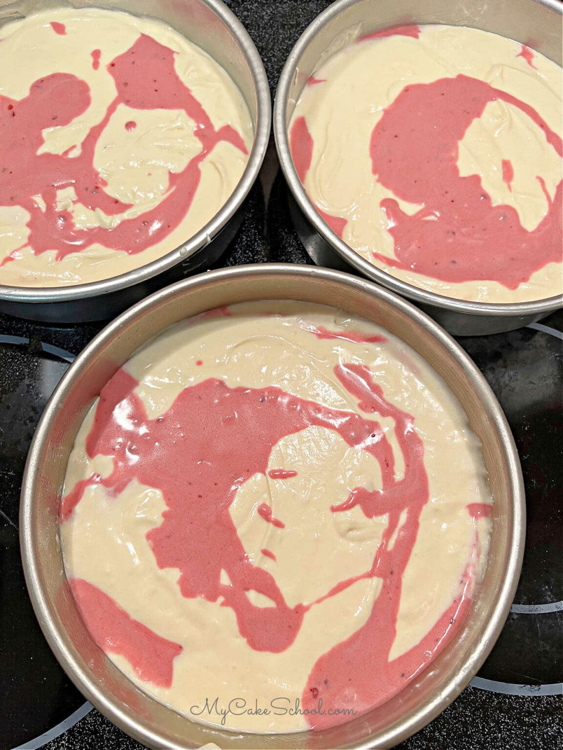 Almond Raspberry Swirl Cake - My Cake School