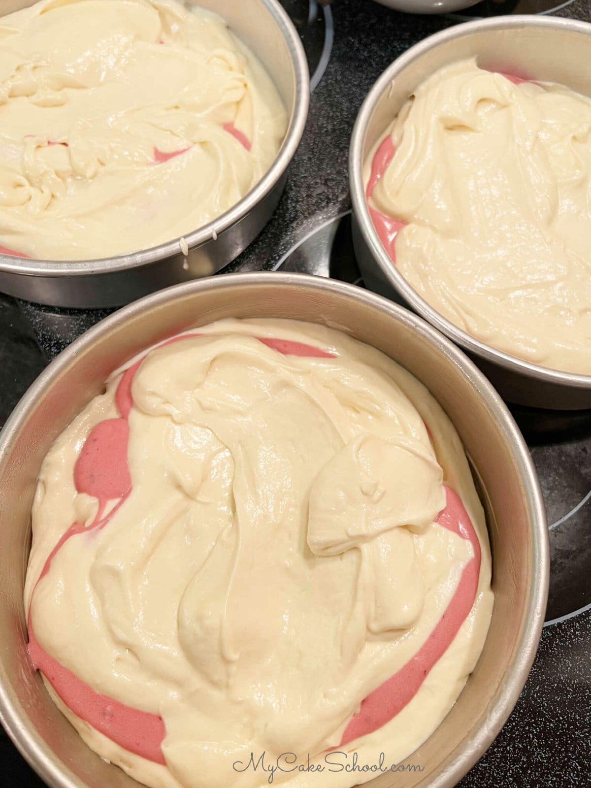 Almond Raspberry Swirl Cake - My Cake School