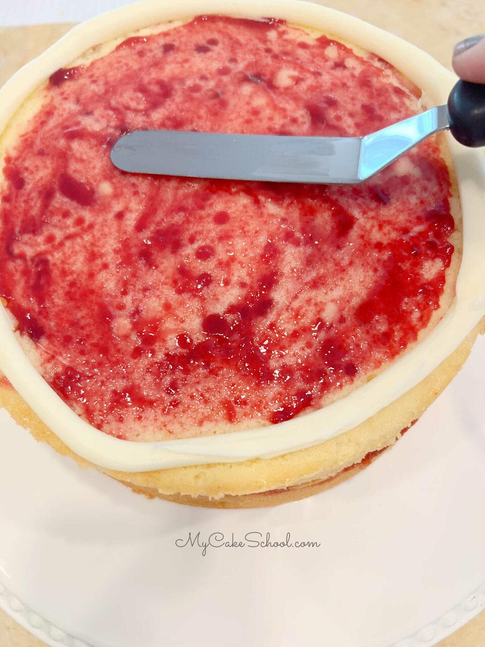 Almond Raspberry Swirl Cake - My Cake School